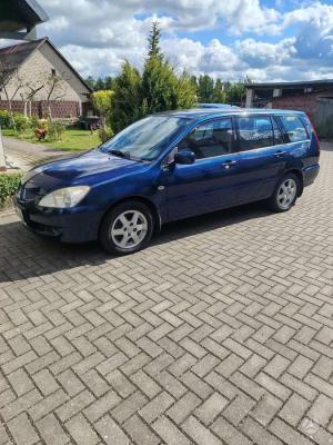 Blue Mitsubishi Lancer 2006 in Alytus, with an engine capacity of 1.58 L and mileage of 116 thousand km for 1900 €, photo  on AUTOMOTO.COM.LV
