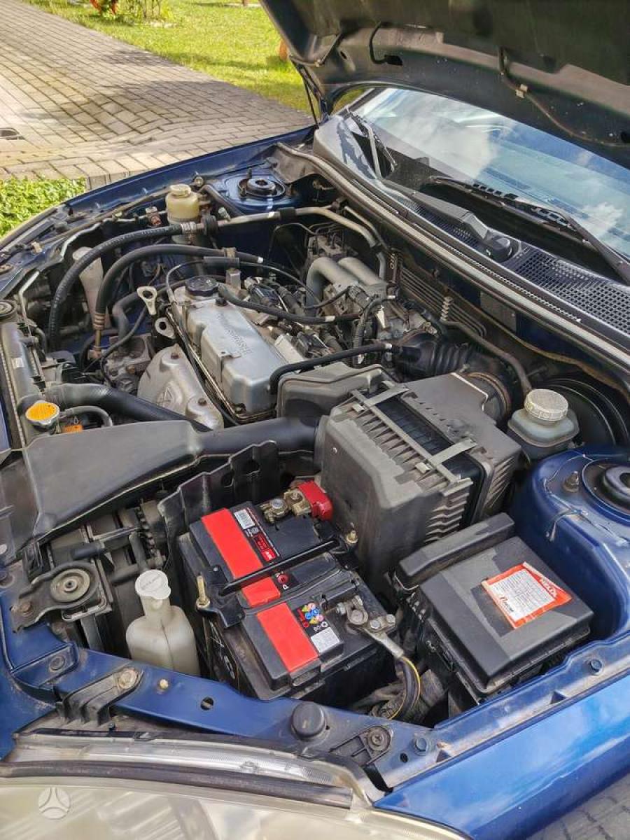 Blue Mitsubishi Lancer 2006 in Alytus, with an engine capacity of 1.58 L and mileage of 116 thousand km for 1900 €, photo 9 on AUTOMOTO.COM.LV