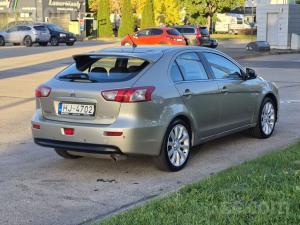 Brūns Mitsubishi Lancer 2009 Rīga, ar dzinēja tilpumu 1.80 L un nobraukumu 260 tūkst. km par 3200 €, foto 6 vietnē AUTOMOTO.COM.LV