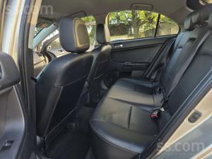 Brūns Mitsubishi Lancer 2009 Rīga, ar dzinēja tilpumu 1.80 L un nobraukumu 260 tūkst. km par 3200 €, foto 12 vietnē AUTOMOTO.COM.LV