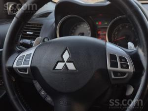 Brūns Mitsubishi Lancer 2009 Rīga, ar dzinēja tilpumu 1.80 L un nobraukumu 260 tūkst. km par 3200 €, foto 15 vietnē AUTOMOTO.COM.LV