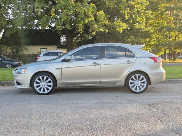 Brown Mitsubishi Lancer 2009 in Riga, with an engine capacity of 1.80 L and mileage of 260 thousand km for 3200 €, photo 8 on AUTOMOTO.COM.LV
