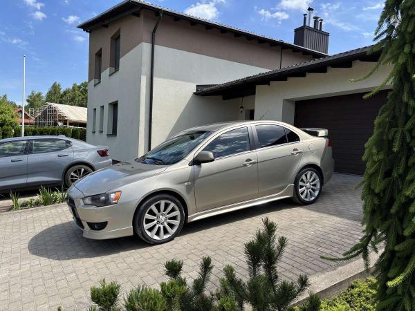Brown Mitsubishi Lancer 2009 in Vilnius, with an engine capacity of 1.80 L and mileage of 200 thousand km for 3000 €, photo 1 on AUTOMOTO.COM.LV