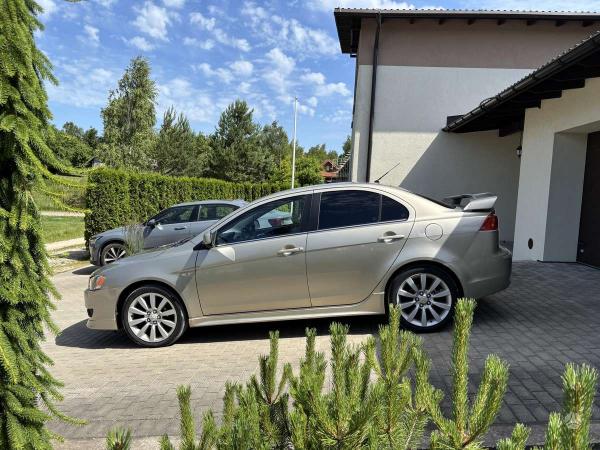 Brown Mitsubishi Lancer 2009 in Vilnius, with an engine capacity of 1.80 L and mileage of 200 thousand km for 3000 €, photo 2 on AUTOMOTO.COM.LV
