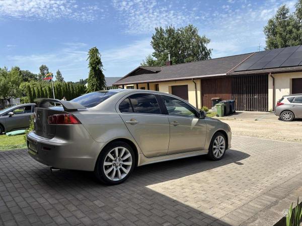 Brown Mitsubishi Lancer 2009 in Vilnius, with an engine capacity of 1.80 L and mileage of 200 thousand km for 3000 €, photo 5 on AUTOMOTO.COM.LV