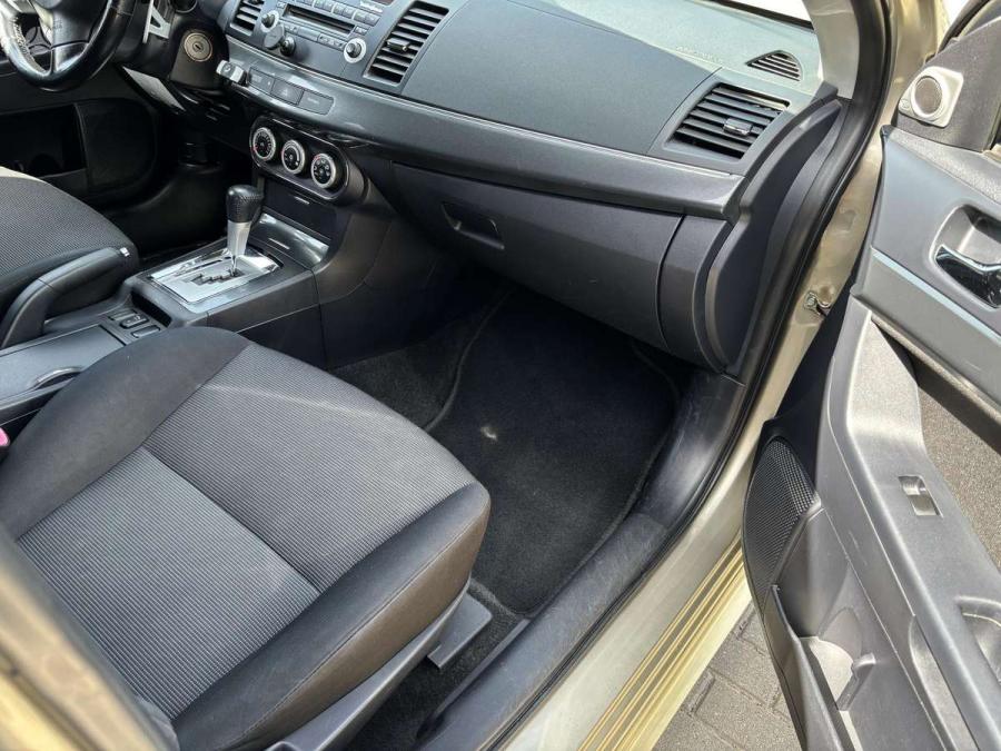 Brūns Mitsubishi Lancer 2009 Viļņa, ar dzinēja tilpumu 1.80 L un nobraukumu 200 tūkst. km par 3000 €, foto 13 vietnē AUTOMOTO.COM.LV