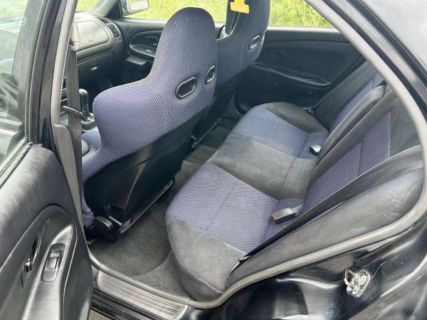 Melns Mitsubishi lancer-evolution 1996 Alīta, ar dzinēja tilpumu 2.00 L un nobraukumu 170 tūkst. km par 14200 €, foto 10 vietnē AUTOMOTO.COM.LV