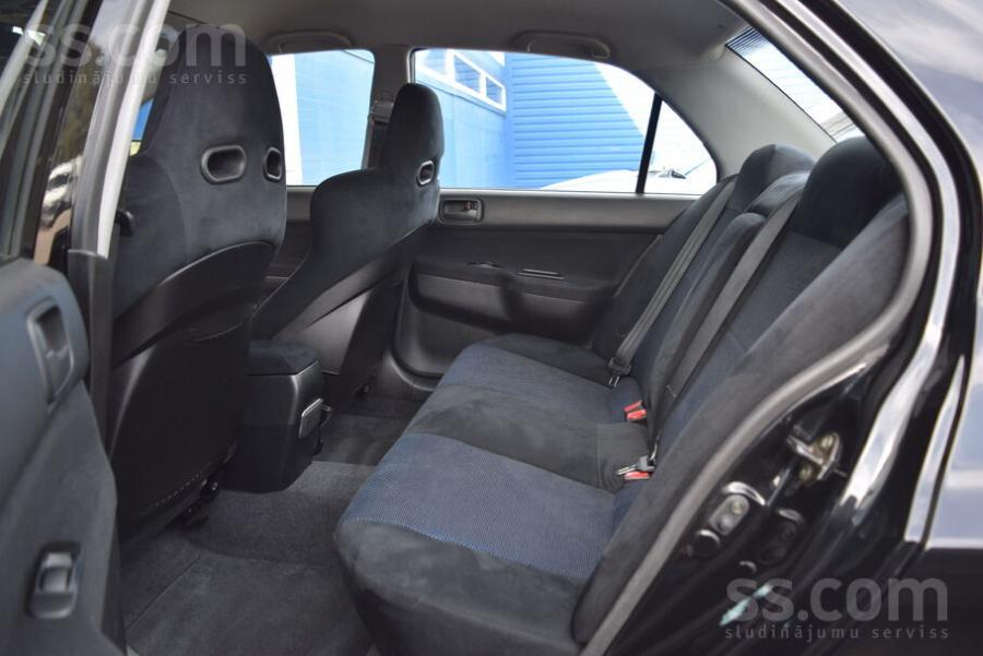 Black Mitsubishi lancer-evolution 2001 in Riga, with an engine capacity of 2.00 L and mileage of 192 thousand km for 47500 €, photo 11 on AUTOMOTO.COM.LV