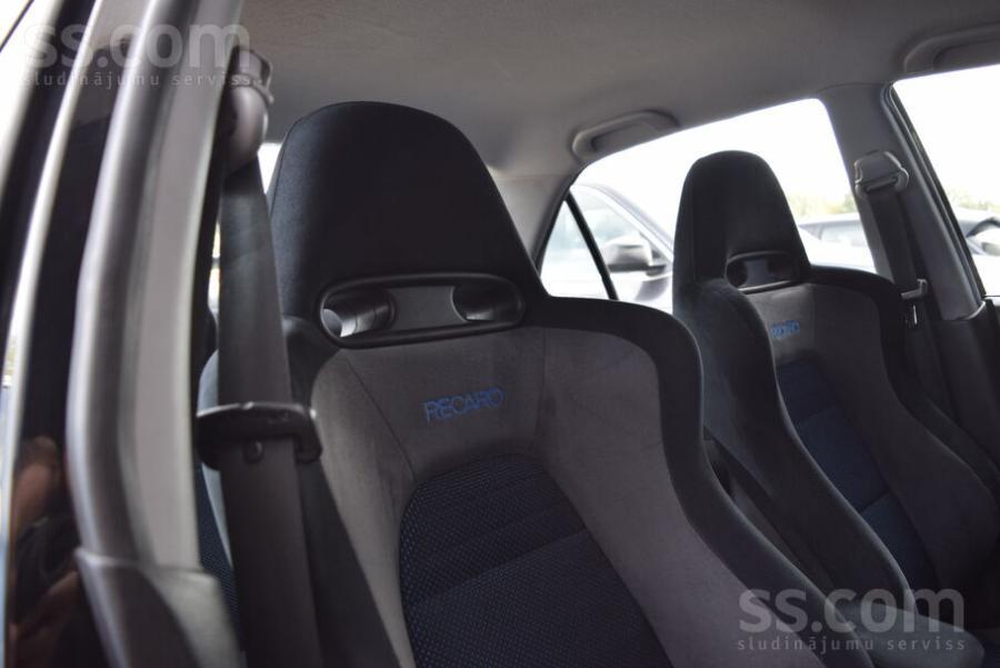 Black Mitsubishi lancer-evolution 2001 in Riga, with an engine capacity of 2.00 L and mileage of 192 thousand km for 47500 €, photo 12 on AUTOMOTO.COM.LV