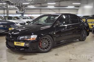 Black Mitsubishi lancer-evolution 2005 in Riga, with an engine capacity of 2.00 L and mileage of 133 thousand km for 34900 €, photo  on AUTOMOTO.COM.LV