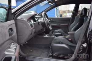 Black Mitsubishi lancer-evolution 2005 in Riga, with an engine capacity of 2.00 L and mileage of 133 thousand km for 34900 €, photo 4 on AUTOMOTO.COM.LV