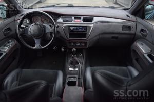Black Mitsubishi lancer-evolution 2005 in Riga, with an engine capacity of 2.00 L and mileage of 133 thousand km for 34900 €, photo 5 on AUTOMOTO.COM.LV