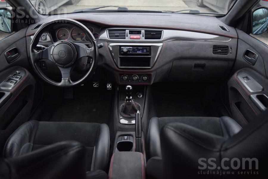 Black Mitsubishi lancer-evolution 2005 in Riga, with an engine capacity of 2.00 L and mileage of 133 thousand km for 34900 €, photo 5 on AUTOMOTO.COM.LV