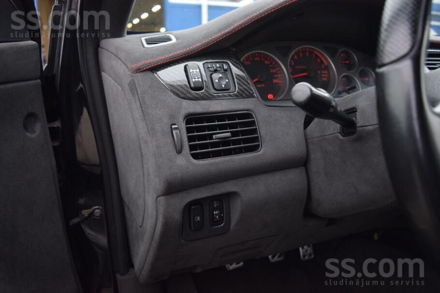 Black Mitsubishi lancer-evolution 2005 in Riga, with an engine capacity of 2.00 L and mileage of 133 thousand km for 34900 €, photo 10 on AUTOMOTO.COM.LV