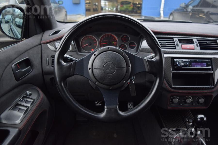 Black Mitsubishi lancer-evolution 2005 in Riga, with an engine capacity of 2.00 L and mileage of 133 thousand km for 34900 €, photo 11 on AUTOMOTO.COM.LV
