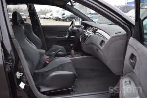 Black Mitsubishi lancer-evolution 2005 in Riga, with an engine capacity of 2.00 L and mileage of 133 thousand km for 34900 €, photo 13 on AUTOMOTO.COM.LV