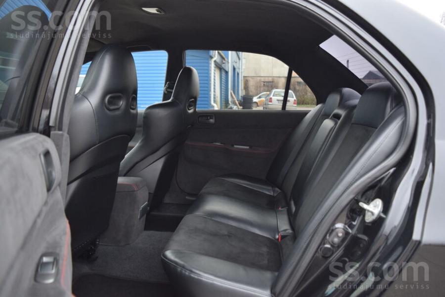Black Mitsubishi lancer-evolution 2005 in Riga, with an engine capacity of 2.00 L and mileage of 133 thousand km for 34900 €, photo 14 on AUTOMOTO.COM.LV