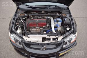 Black Mitsubishi lancer-evolution 2005 in Riga, with an engine capacity of 2.00 L and mileage of 133 thousand km for 34900 €, photo 15 on AUTOMOTO.COM.LV