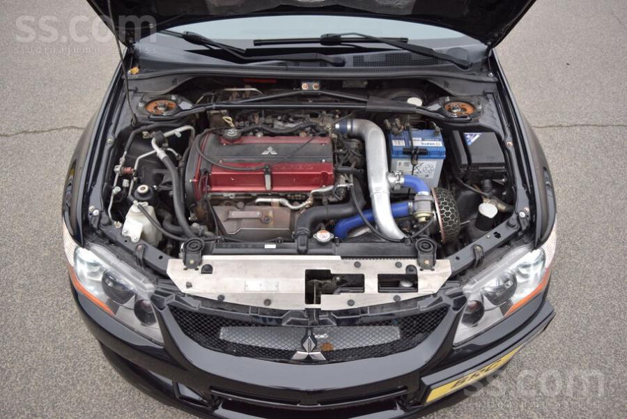 Black Mitsubishi lancer-evolution 2005 in Riga, with an engine capacity of 2.00 L and mileage of 133 thousand km for 34900 €, photo 15 on AUTOMOTO.COM.LV