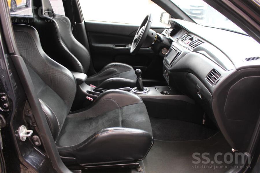 Melns Mitsubishi lancer-evolution 2006 Rīga, ar dzinēja tilpumu 2.00 L un nobraukumu 187 tūkst. km par 44950 €, foto 18 vietnē AUTOMOTO.COM.LV