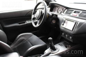Melns Mitsubishi lancer-evolution 2006 Rīga, ar dzinēja tilpumu 2.00 L un nobraukumu 187 tūkst. km par 44950 €, foto 20 vietnē AUTOMOTO.COM.LV