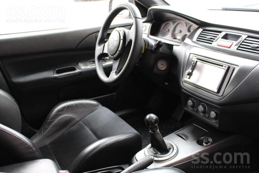 Melns Mitsubishi lancer-evolution 2006 Rīga, ar dzinēja tilpumu 2.00 L un nobraukumu 187 tūkst. km par 44950 €, foto 20 vietnē AUTOMOTO.COM.LV