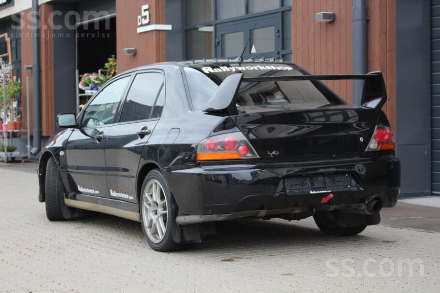 Melns Mitsubishi lancer-evolution 2006 Rīga, ar dzinēja tilpumu 2.00 L un nobraukumu 187 tūkst. km par 44950 €, foto 3 vietnē AUTOMOTO.COM.LV