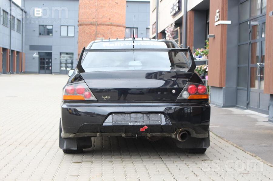 Melns Mitsubishi lancer-evolution 2006 Rīga, ar dzinēja tilpumu 2.00 L un nobraukumu 187 tūkst. km par 44950 €, foto 4 vietnē AUTOMOTO.COM.LV