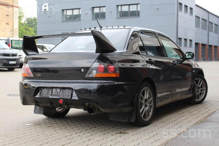 Melns Mitsubishi lancer-evolution 2006 Rīga, ar dzinēja tilpumu 2.00 L un nobraukumu 187 tūkst. km par 44950 €, foto 5 vietnē AUTOMOTO.COM.LV