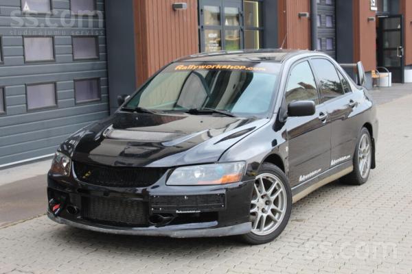 Melns Mitsubishi lancer-evolution 2006 Rīga, ar dzinēja tilpumu 2.00 L un nobraukumu 187 tūkst. km par 44950 €, foto 5 vietnē AUTOMOTO.COM.LV