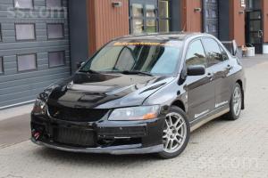 Melns Mitsubishi lancer-evolution 2006 Rīga, ar dzinēja tilpumu 2.00 L un nobraukumu 187 tūkst. km par 44950 €, foto 6 vietnē AUTOMOTO.COM.LV