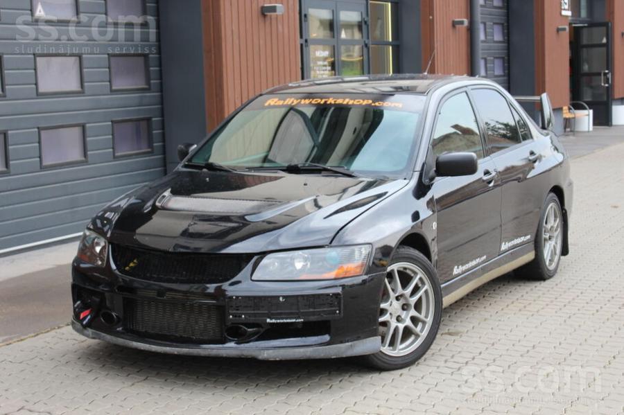Melns Mitsubishi lancer-evolution 2006 Rīga, ar dzinēja tilpumu 2.00 L un nobraukumu 187 tūkst. km par 44950 €, foto 6 vietnē AUTOMOTO.COM.LV