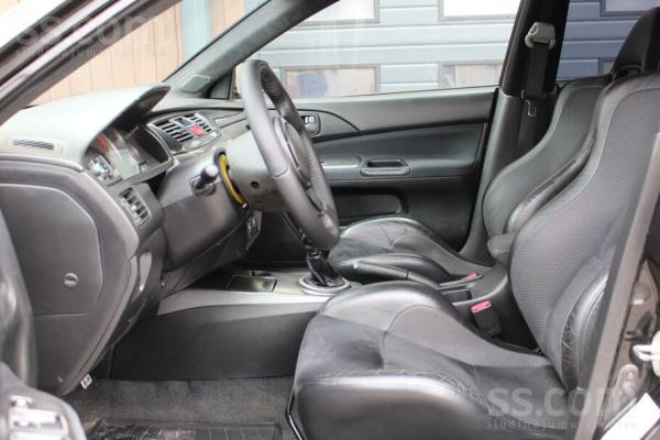 Melns Mitsubishi lancer-evolution 2006 Rīga, ar dzinēja tilpumu 2.00 L un nobraukumu 187 tūkst. km par 44950 €, foto 8 vietnē AUTOMOTO.COM.LV