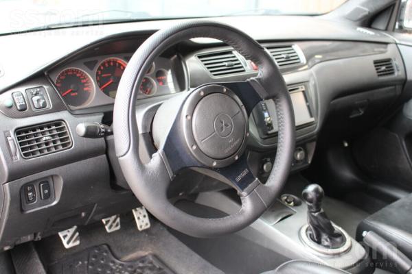 Melns Mitsubishi lancer-evolution 2006 Rīga, ar dzinēja tilpumu 2.00 L un nobraukumu 187 tūkst. km par 44950 €, foto 10 vietnē AUTOMOTO.COM.LV