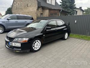 Black Mitsubishi lancer-evolution 2006 in Jelgava, with an engine capacity of 2.00 L and mileage of 87 thousand km for 17900 €, photo  on AUTOMOTO.COM.LV
