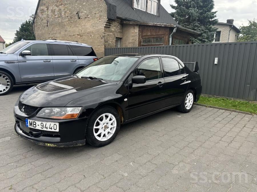 Melns Mitsubishi lancer-evolution 2006 Jelgava, ar dzinēja tilpumu 2.00 L un nobraukumu 87 tūkst. km par 17900 €, foto 1 vietnē AUTOMOTO.COM.LV