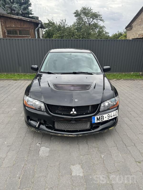 Black Mitsubishi lancer-evolution 2006 in Jelgava, with an engine capacity of 2.00 L and mileage of 87 thousand km for 17900 €, photo 3 on AUTOMOTO.COM.LV