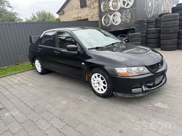 Black Mitsubishi lancer-evolution 2006 in Jelgava, with an engine capacity of 2.00 L and mileage of 87 thousand km for 17900 €, photo 4 on AUTOMOTO.COM.LV