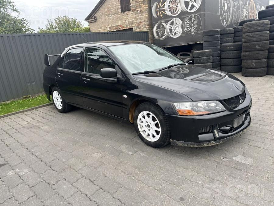 Melns Mitsubishi lancer-evolution 2006 Jelgava, ar dzinēja tilpumu 2.00 L un nobraukumu 87 tūkst. km par 17900 €, foto 4 vietnē AUTOMOTO.COM.LV