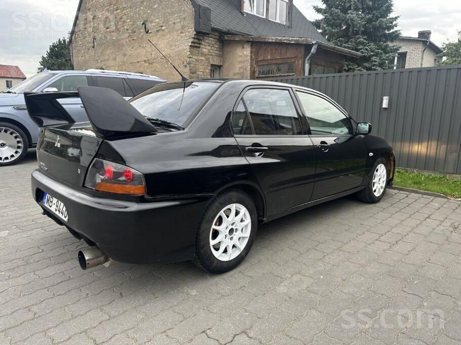 Melns Mitsubishi lancer-evolution 2006 Jelgava, ar dzinēja tilpumu 2.00 L un nobraukumu 87 tūkst. km par 17900 €, foto 8 vietnē AUTOMOTO.COM.LV