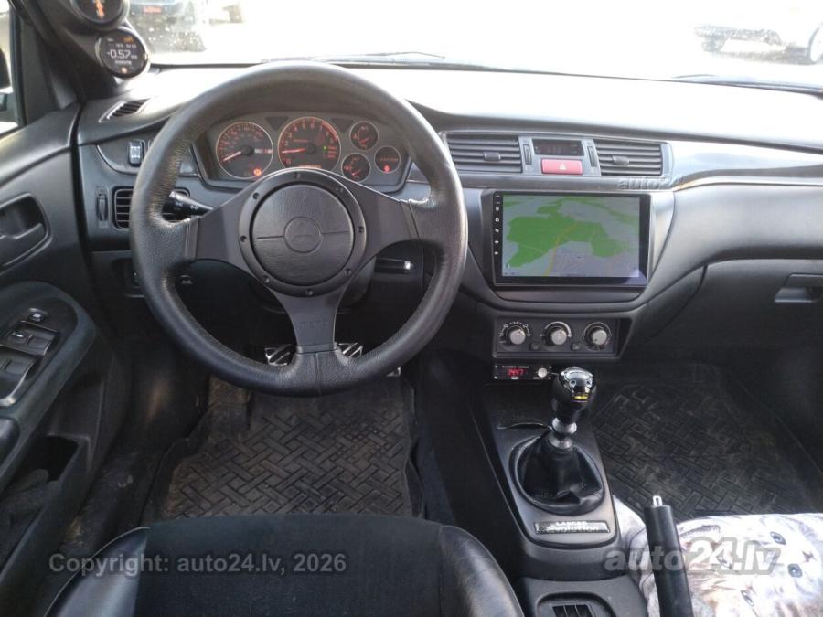 Black Mitsubishi lancer-evolution 2007 in Tallinn, with an engine capacity of 2.00 L and mileage of 192 thousand km for 27000 €, photo 5 on AUTOMOTO.COM.LV