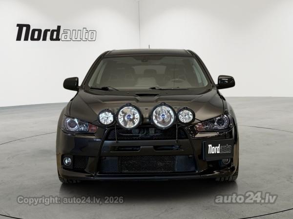 Melns Mitsubishi lancer-evolution 2010 Tallina, ar dzinēja tilpumu 2.00 L un nobraukumu 146 tūkst. km par 32900 €, foto 3 vietnē AUTOMOTO.COM.LV