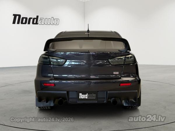 Melns Mitsubishi lancer-evolution 2010 Tallina, ar dzinēja tilpumu 2.00 L un nobraukumu 146 tūkst. km par 32900 €, foto 4 vietnē AUTOMOTO.COM.LV