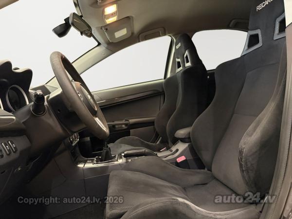 Melns Mitsubishi lancer-evolution 2010 Tallina, ar dzinēja tilpumu 2.00 L un nobraukumu 146 tūkst. km par 32900 €, foto 5 vietnē AUTOMOTO.COM.LV