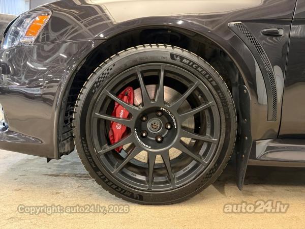 Melns Mitsubishi lancer-evolution 2010 Tallina, ar dzinēja tilpumu 2.00 L un nobraukumu 146 tūkst. km par 32900 €, foto 8 vietnē AUTOMOTO.COM.LV