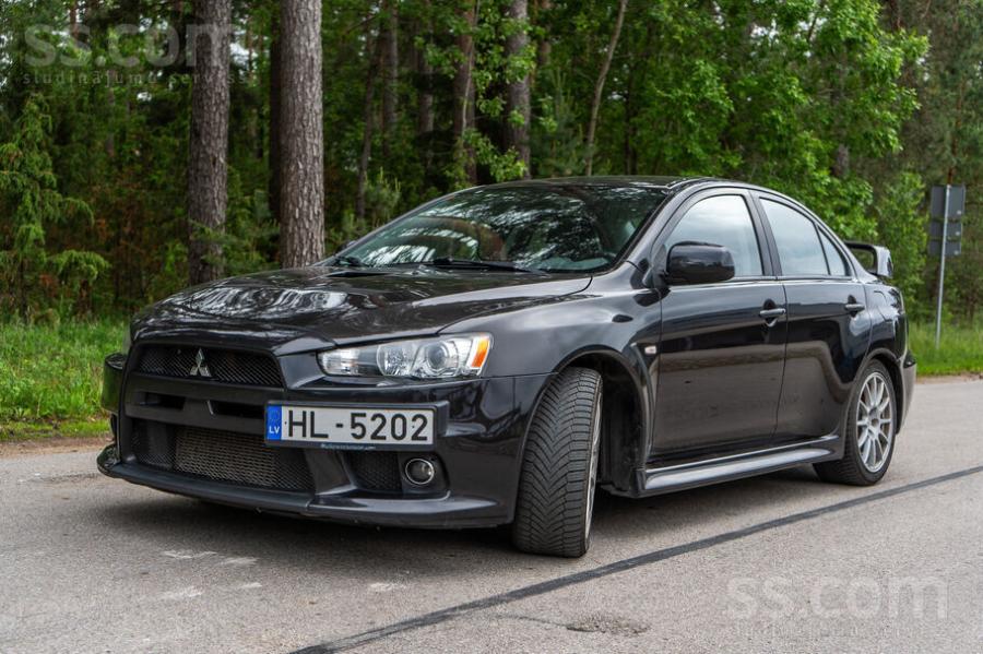 Melns Mitsubishi lancer-evolution 2012 Rīga, ar dzinēja tilpumu 2.00 L un nobraukumu 184 tūkst. km par 32000 €, foto 1 vietnē AUTOMOTO.COM.LV