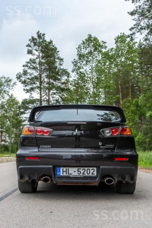 Melns Mitsubishi lancer-evolution 2012 Rīga, ar dzinēja tilpumu 2.00 L un nobraukumu 184 tūkst. km par 32000 €, foto 6 vietnē AUTOMOTO.COM.LV