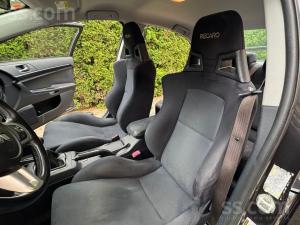 Melns Mitsubishi lancer-evolution 2012 Rīga, ar dzinēja tilpumu 2.00 L un nobraukumu 184 tūkst. km par 32000 €, foto 8 vietnē AUTOMOTO.COM.LV