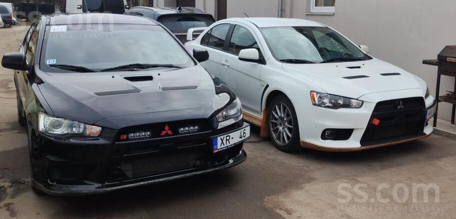 Melns Mitsubishi lancer-evolution 2011 Rīga, ar dzinēja tilpumu 2.00 L un nobraukumu 163 tūkst. km par 13500 €, foto 6 vietnē AUTOMOTO.COM.LV