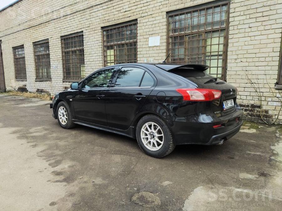 Melns Mitsubishi lancer-evolution 2011 Rīga, ar dzinēja tilpumu 2.00 L un nobraukumu 163 tūkst. km par 13500 €, foto 7 vietnē AUTOMOTO.COM.LV